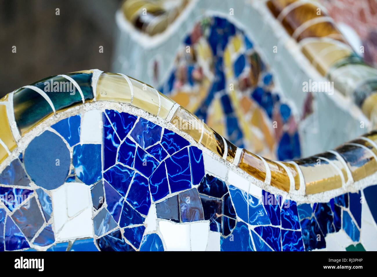 Park Guell. Garden complex with architectural elements situated on the ...