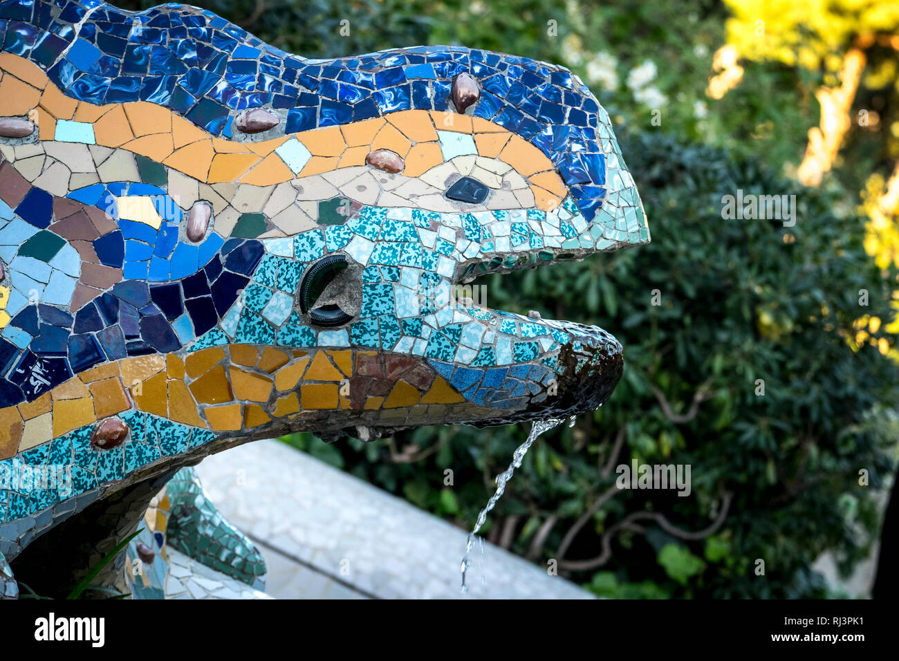 Park Guell. Garden complex with architectural elements situated on the ...