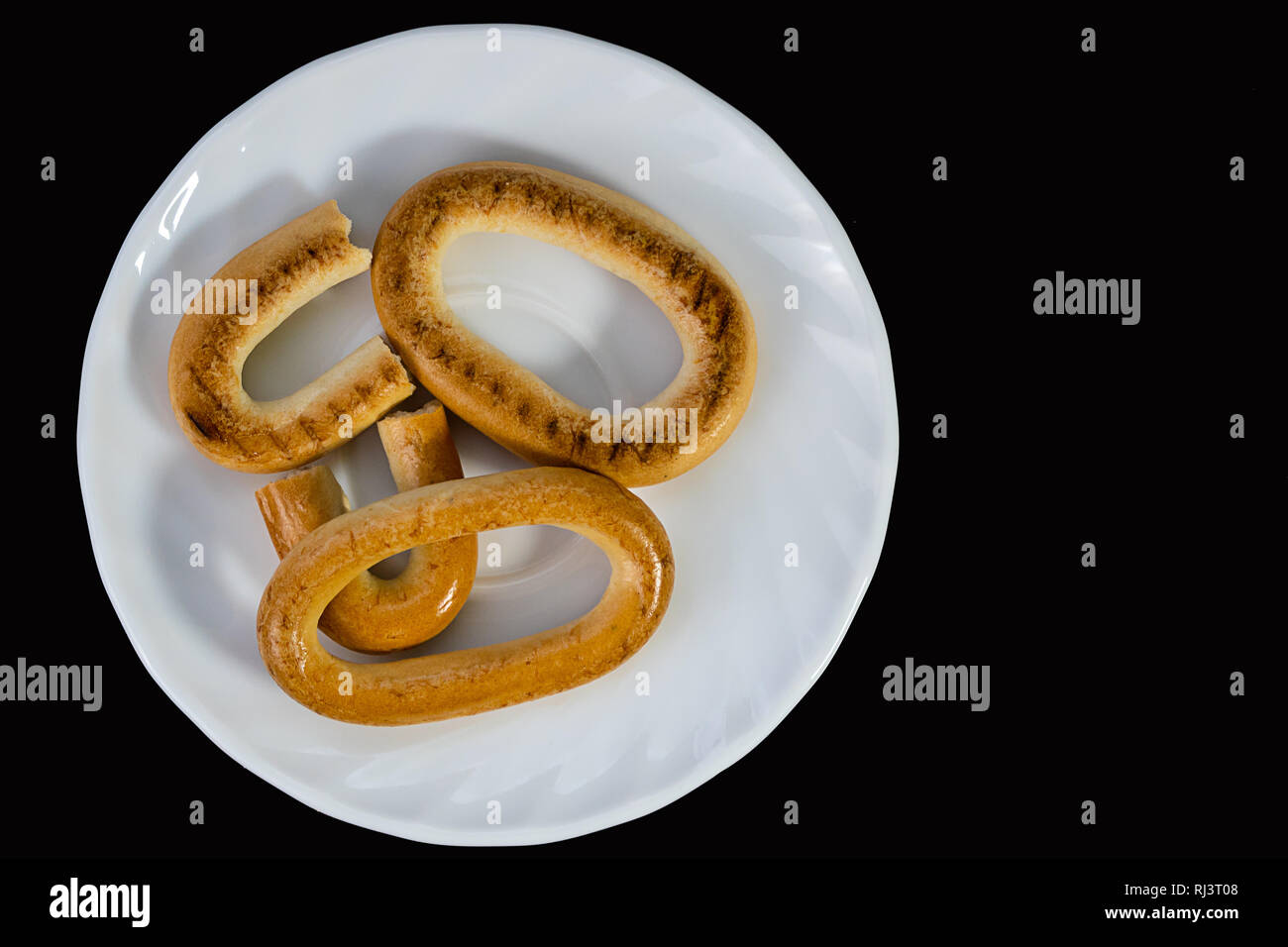 steering-wheels, cookies on a black background, confectionery, baking ...