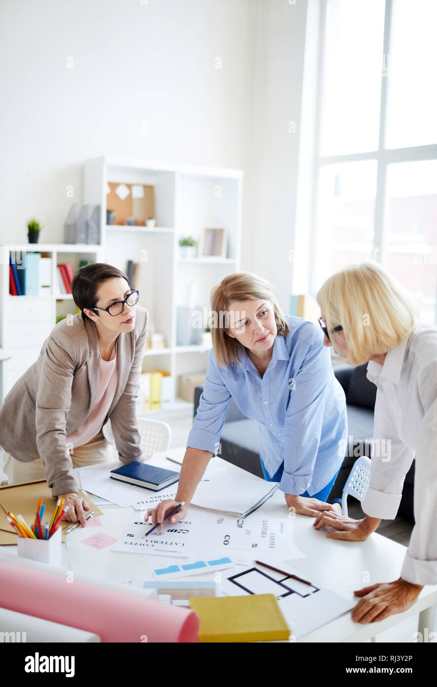 Group of Designers Working Stock Photo - Alamy