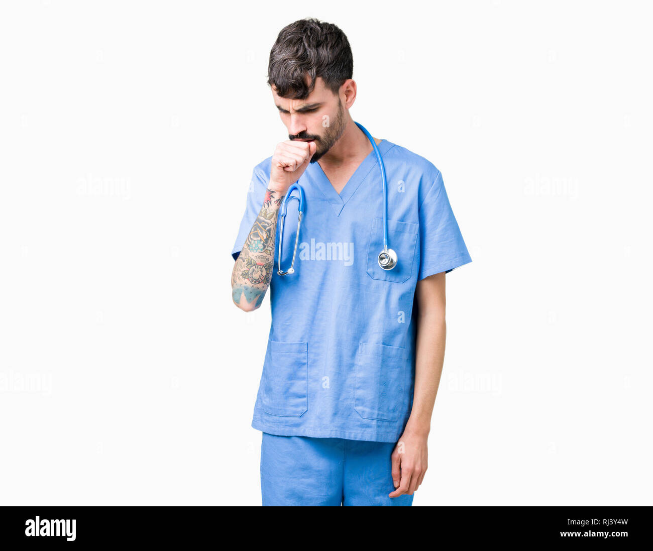 Young handsome nurse man wearing surgeon uniform over isolated ...