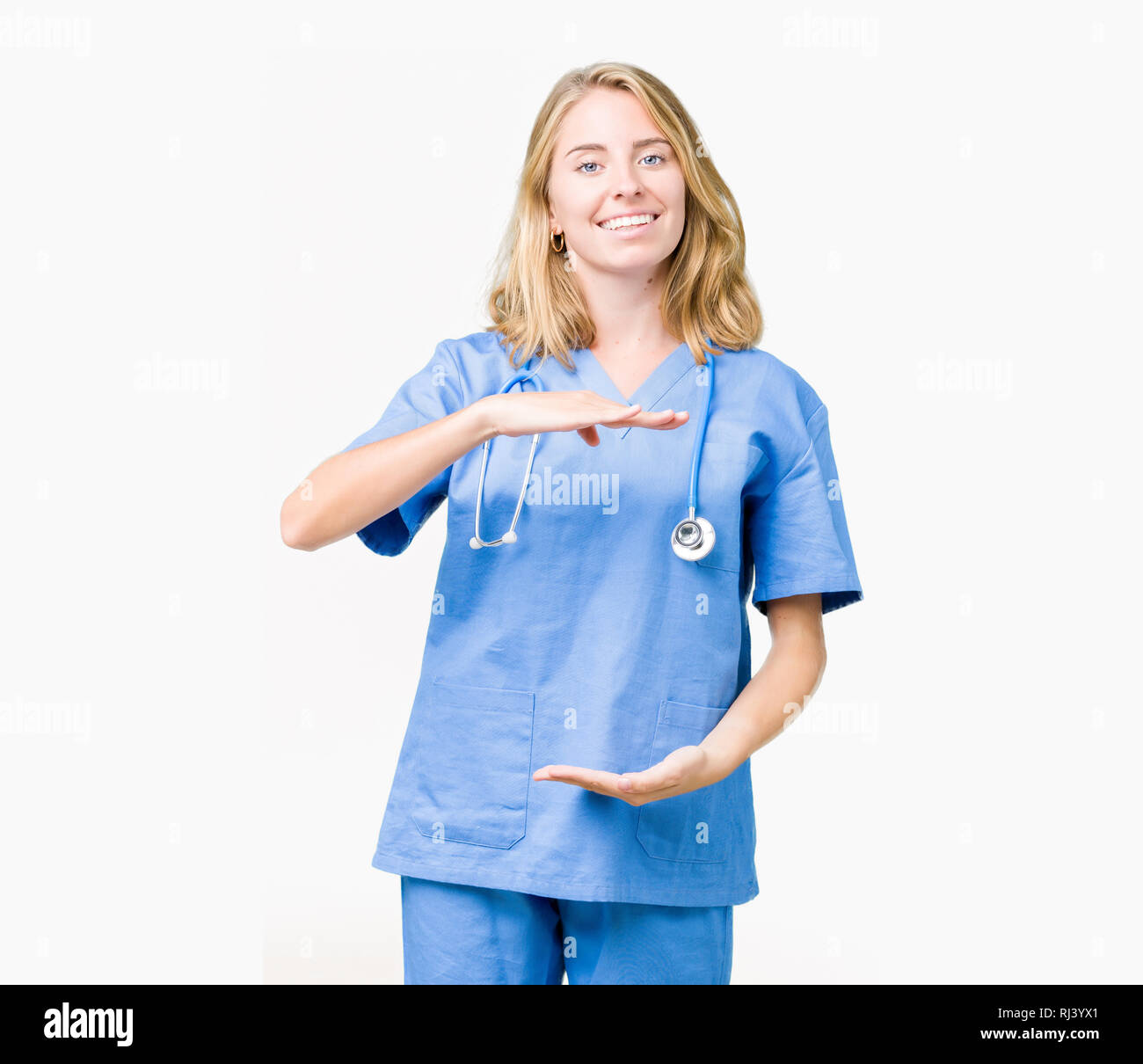 Beautiful young doctor woman wearing medical uniform over isolated ...