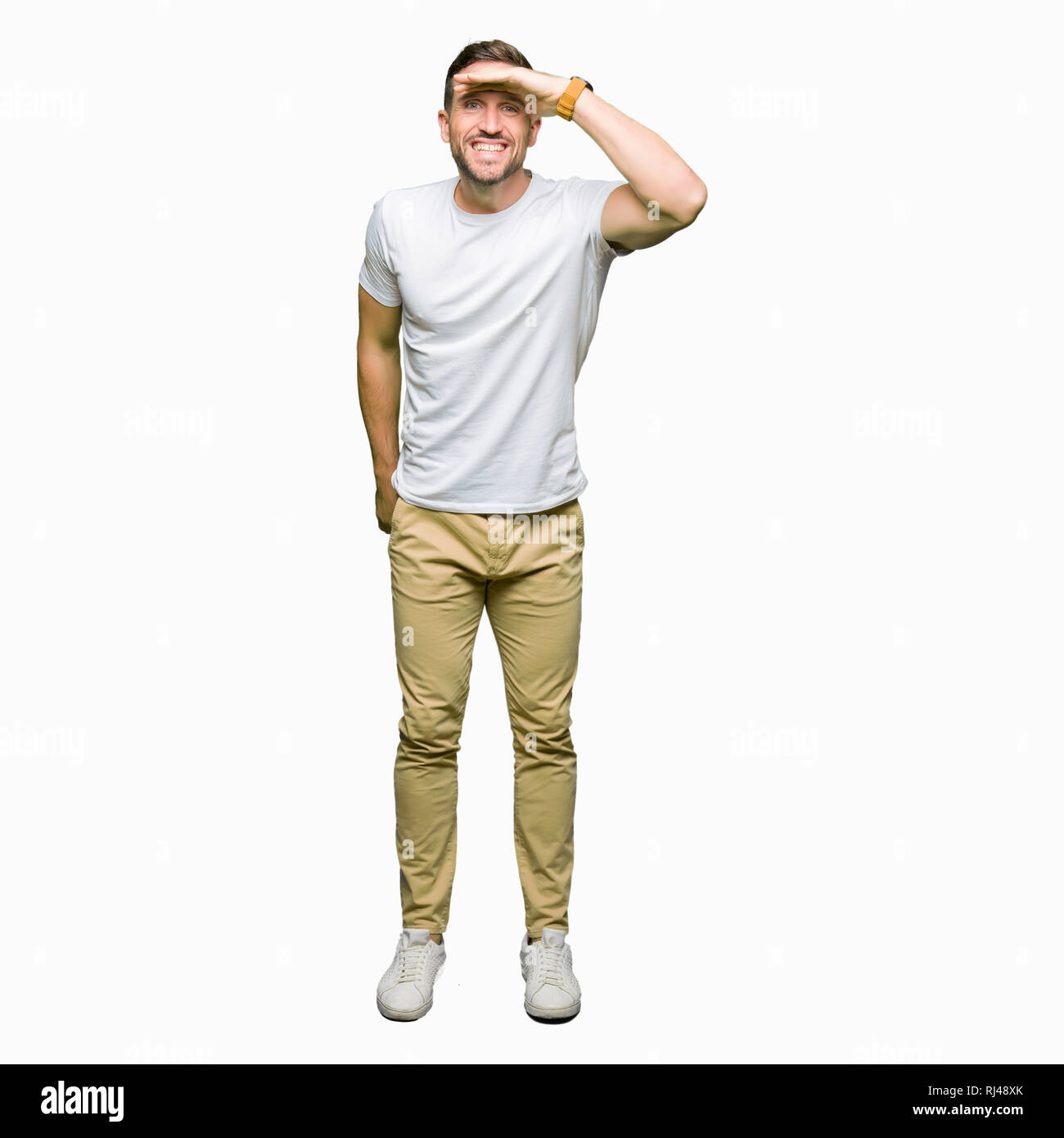 Handsome man wearing casual white t-shirt very happy and smiling ...