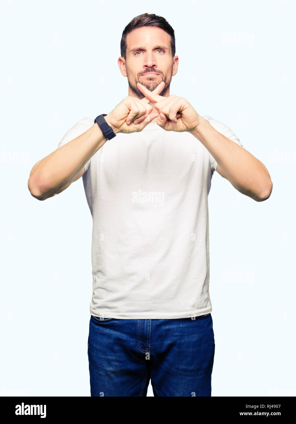 Man cross gesture no white angry hi-res stock photography and images ...