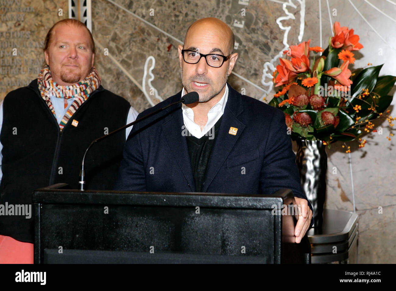 New York, USA. 01 Nov, 2011. Mario Batali, Stanley Tucci, light the The ...