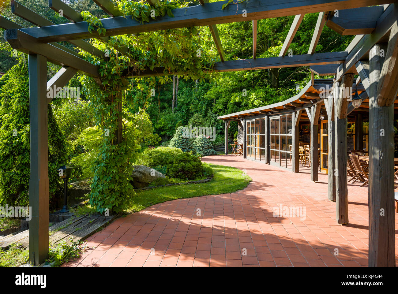 Wooden pergola in old garden Stock Photo - Alamy