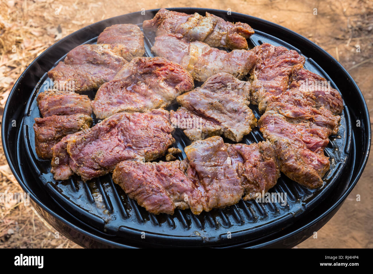 Round barbecue grill hi-res stock photography and images - Alamy