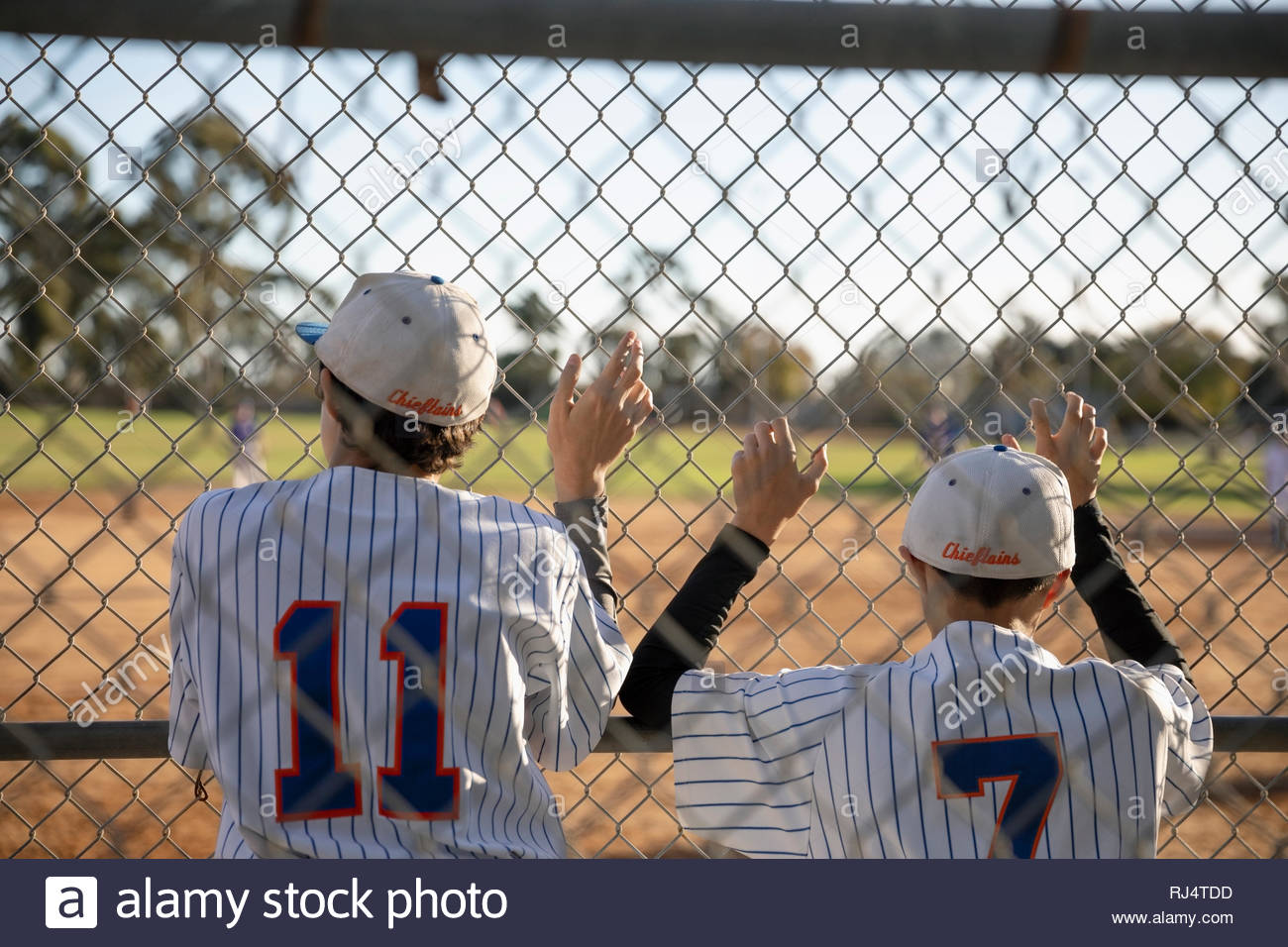 Two school boys from behind hi-res stock photography and images - Alamy