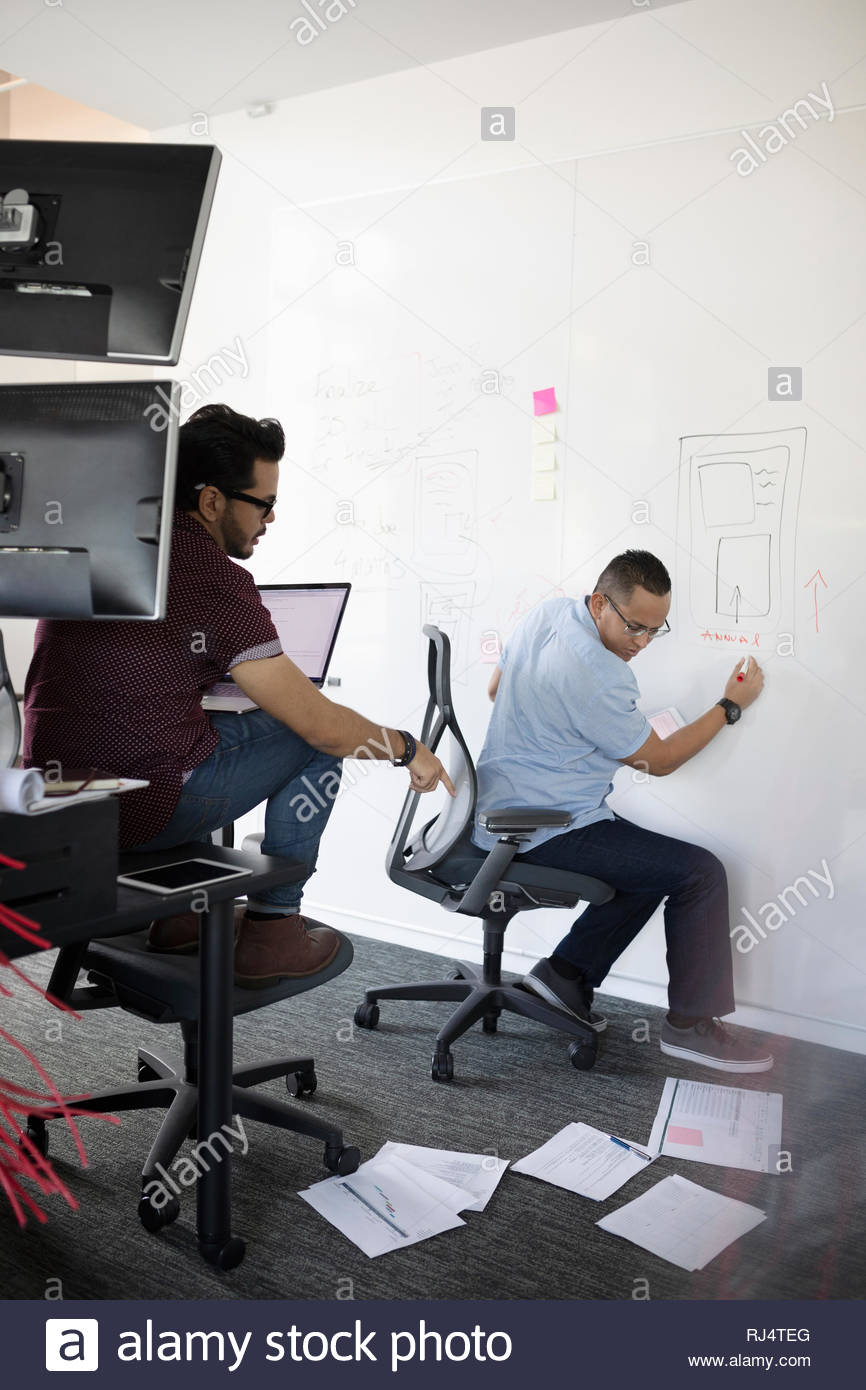 Man sitting down office movement hi-res stock photography and images ...