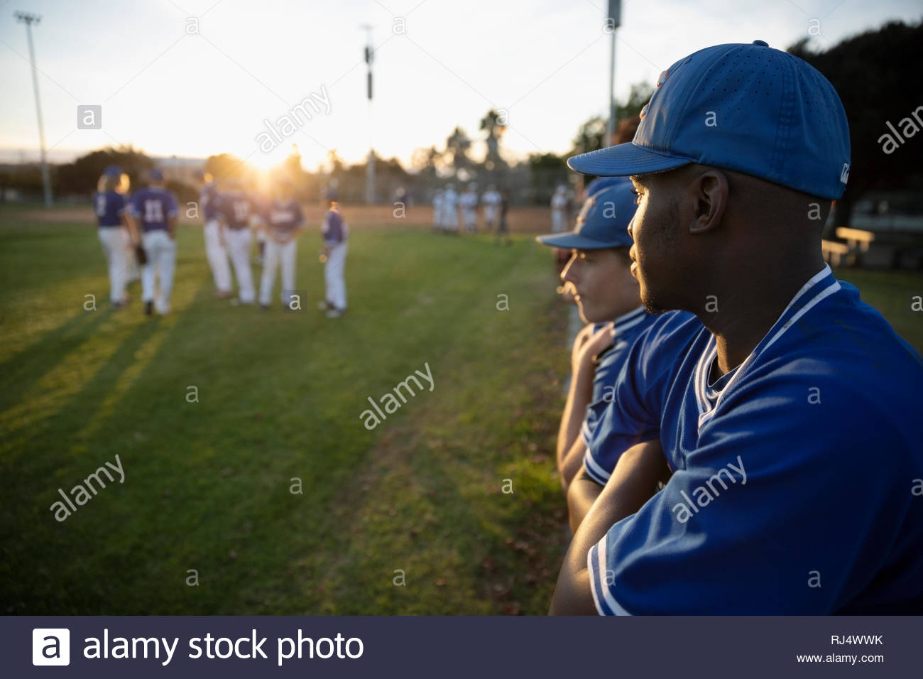 Boys on baseball field hi-res stock photography and images - Alamy