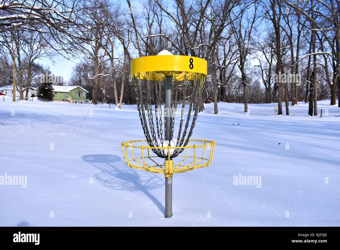a snowed over disc golf course Stock Photo - Alamy