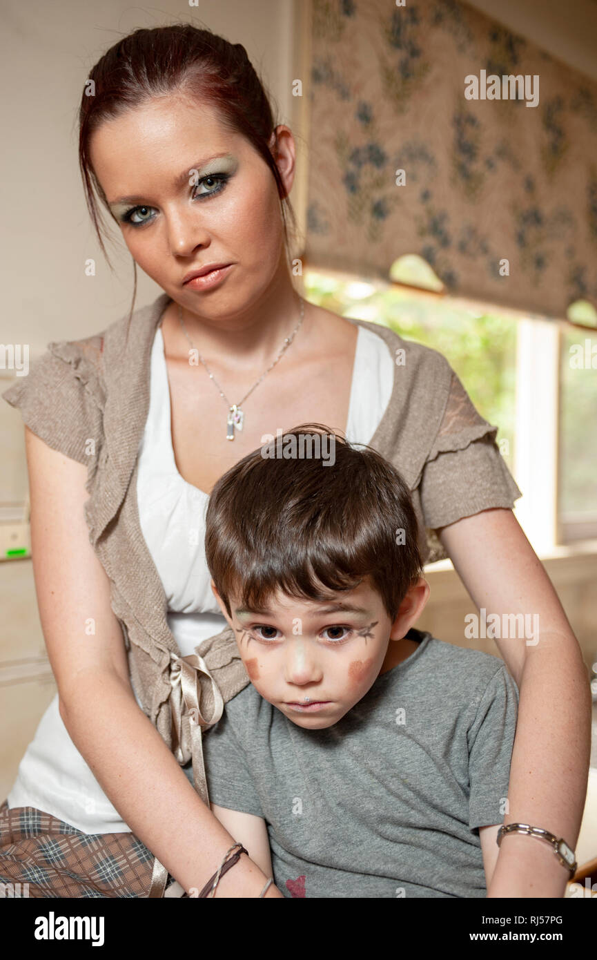 Beautiful young woman and small boy Stock Photo - Alamy