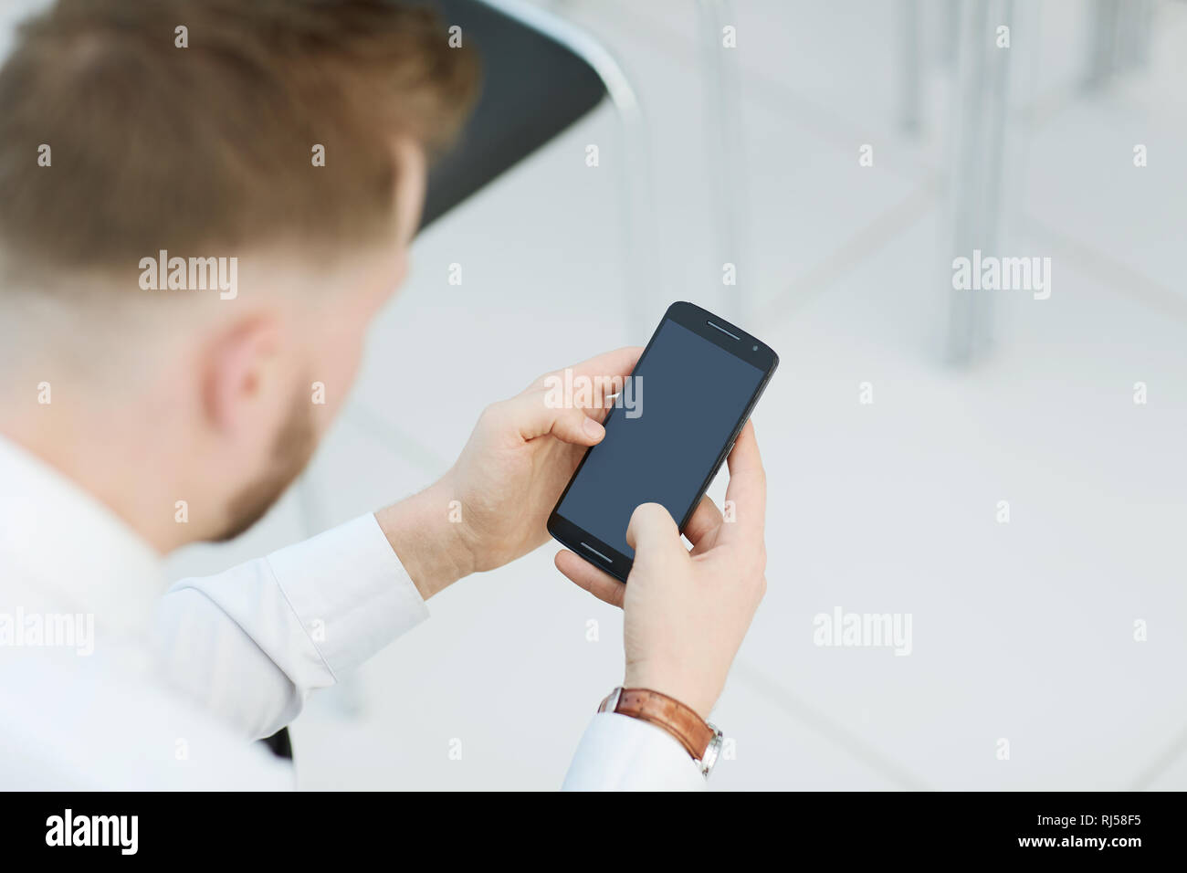 close up.businessman looking at the screen of his smartphone Stock ...