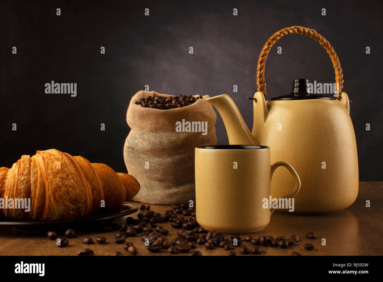 Table top with coffee tea pot, cup and coffee beans, Pune, India Stock ...