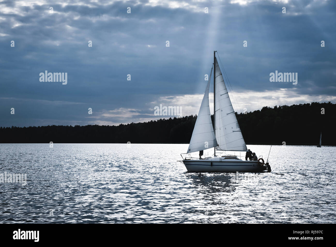 Blue moon light night sailing view at Nidzkie lake in Ruciane-Nida ...