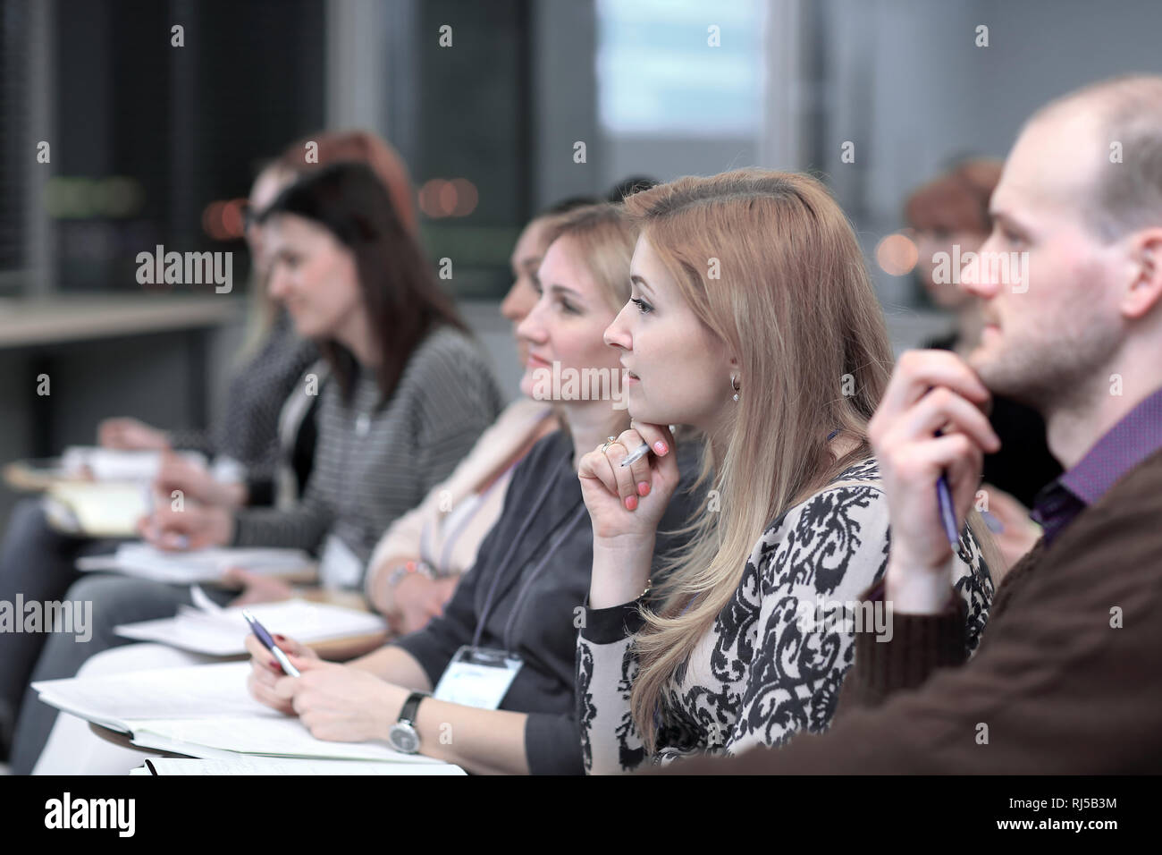 group of people present at business conference Stock Photo - Alamy