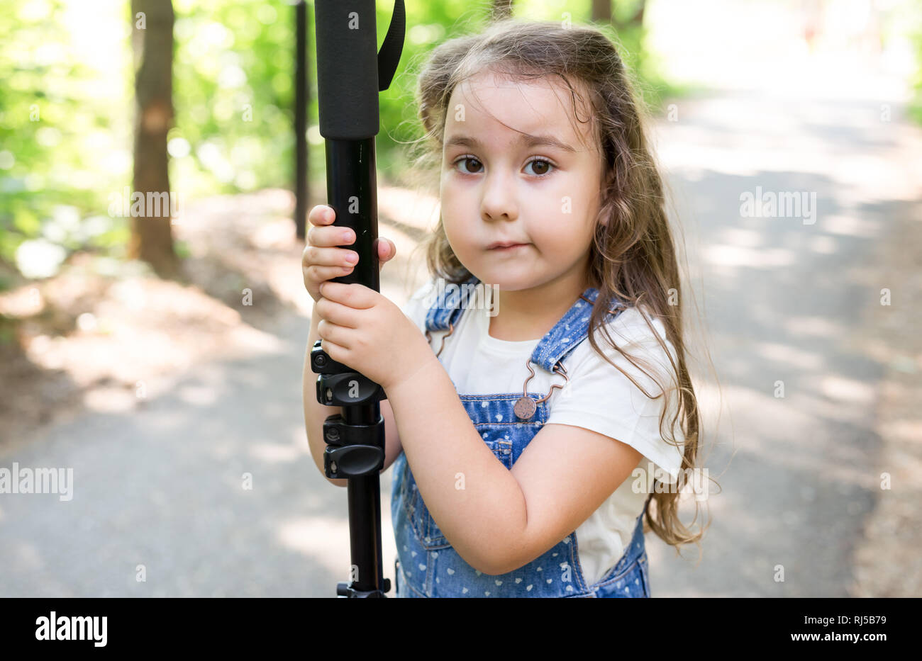 Hobby, profession, children and photographer concept - child with ...