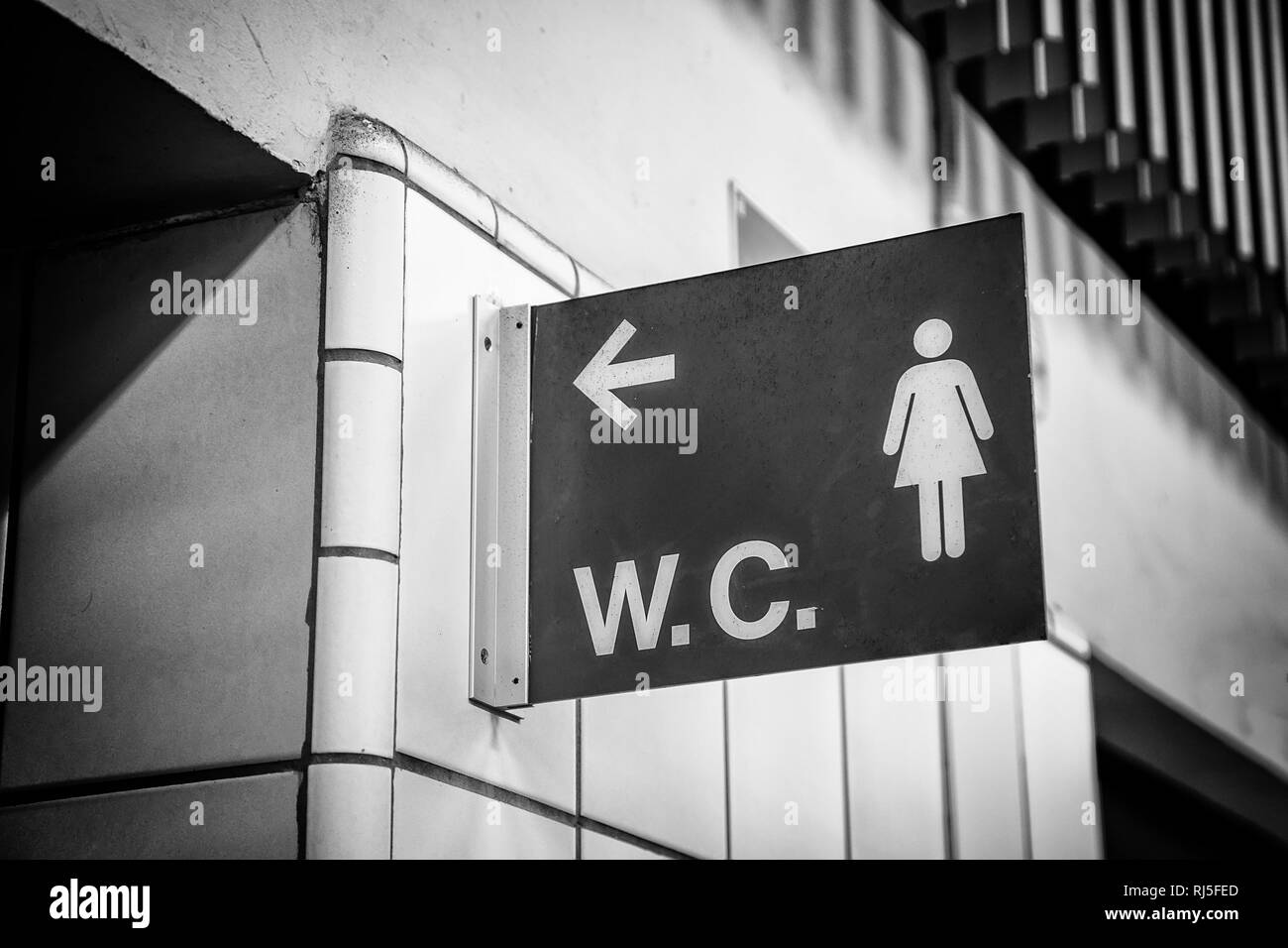 Female toilet signboard Black and White Stock Photos & Images - Alamy