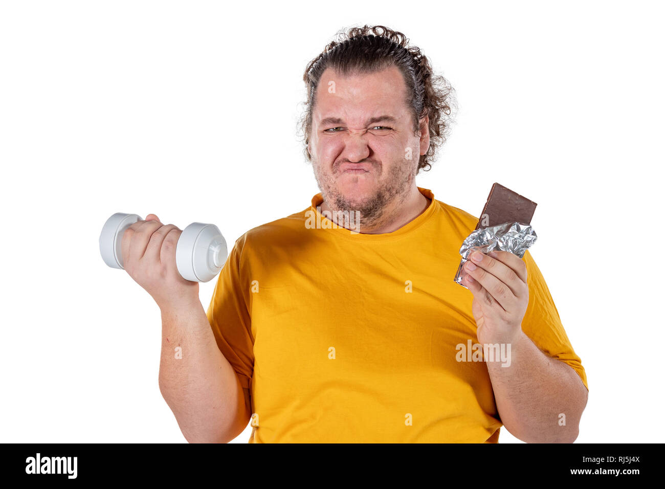 Funny fat man eating unhealthy food and trying to take exercise ...