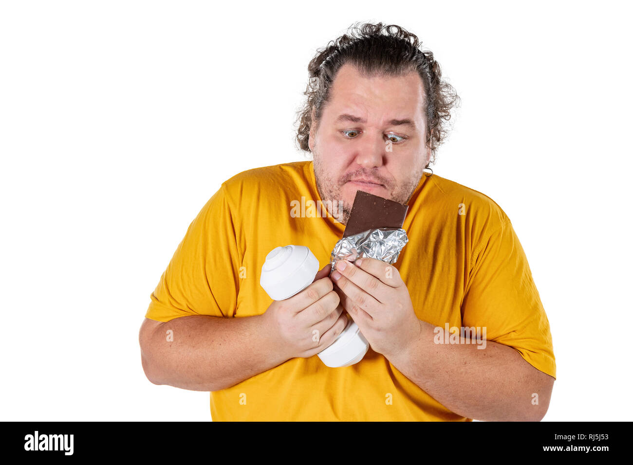 Funny fat man eating unhealthy food and trying to take exercise ...