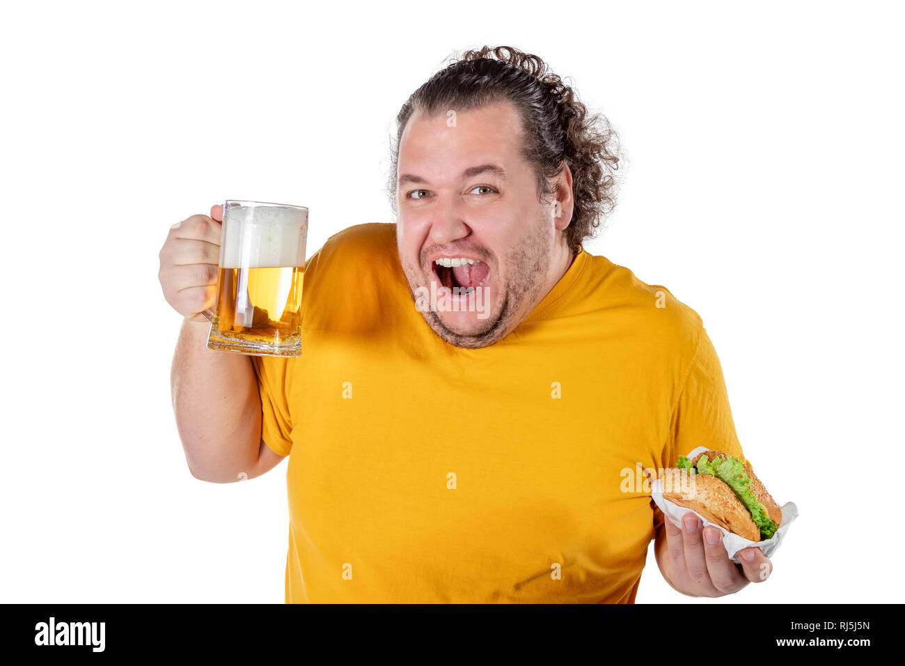 Funny fat man eating burger and drinking alcohol beverage Stock Photo ...