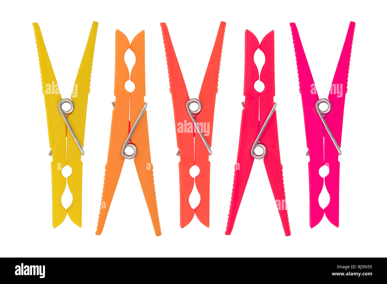 Photo of Color clothes-peg on the white background Stock Photo - Alamy