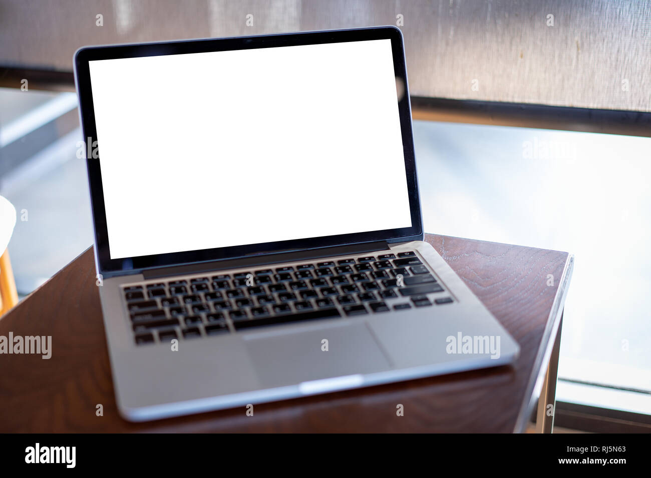 mock up Using laptop with blank screen computer modern Stock Photo - Alamy