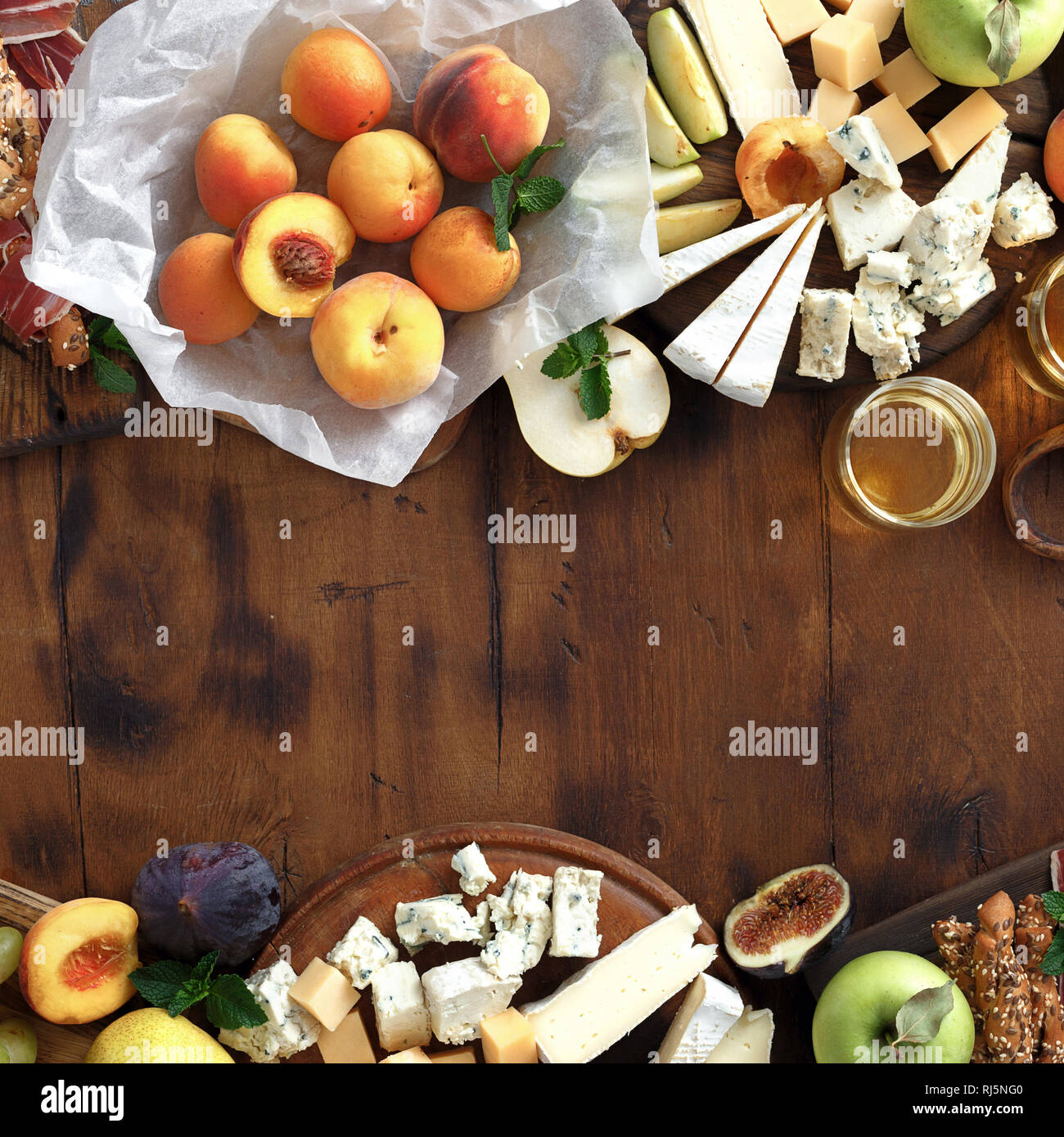 Appetizers table for wine with glass white wine. Frame of various wine ...