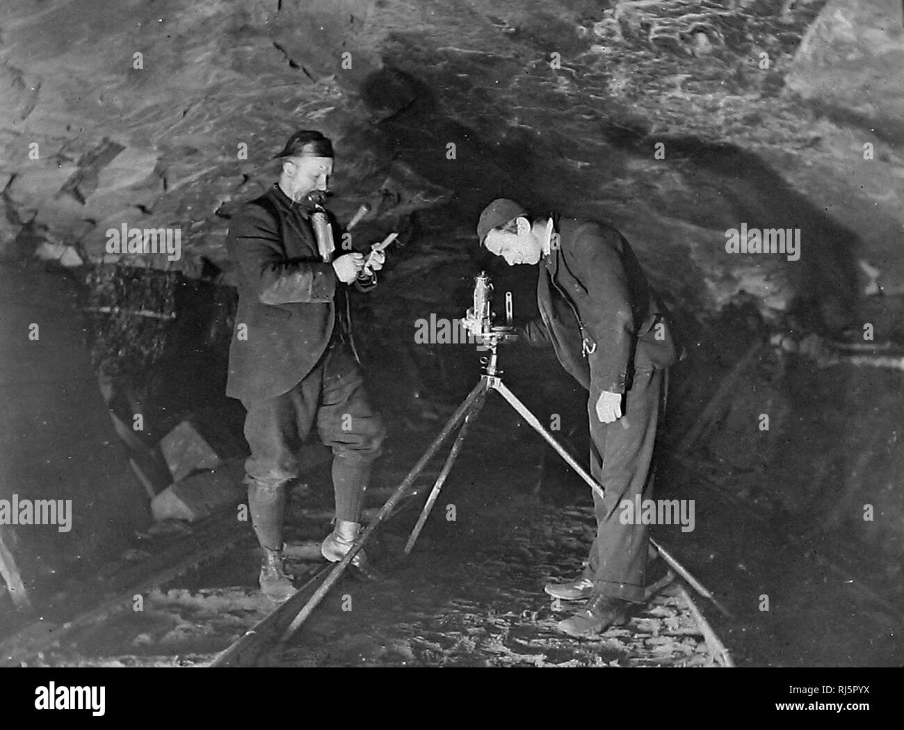 Surveying in a coal mine Stock Photo - Alamy