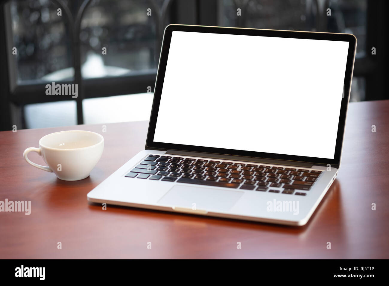 mock up Using laptop with blank screen computer modern Stock Photo - Alamy