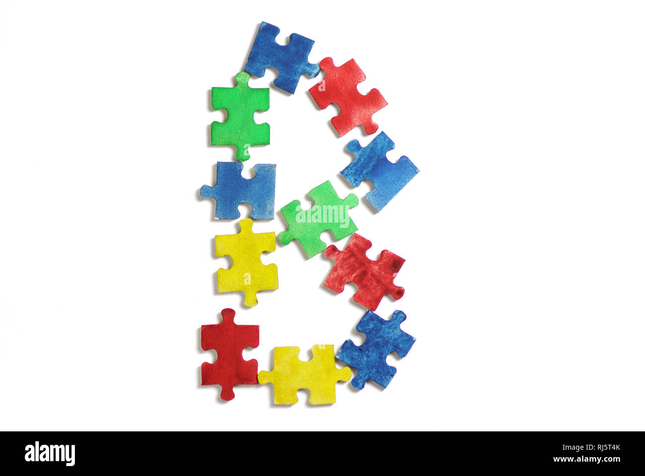 Colourful jigsaw puzzle and alphabet tiles with AUTISM word. Autism ...