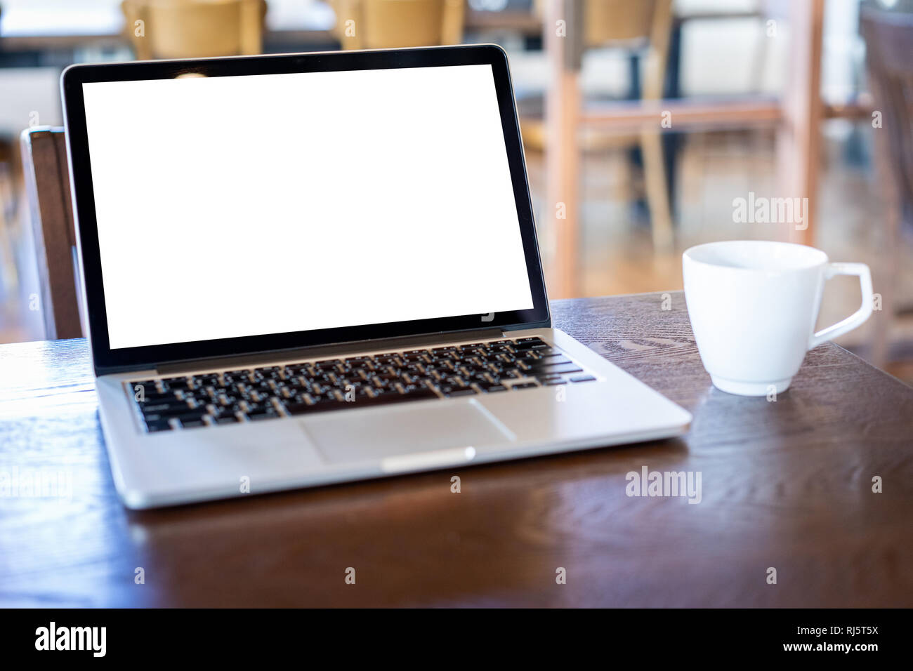 mock up Using laptop with blank screen computer modern Stock Photo - Alamy