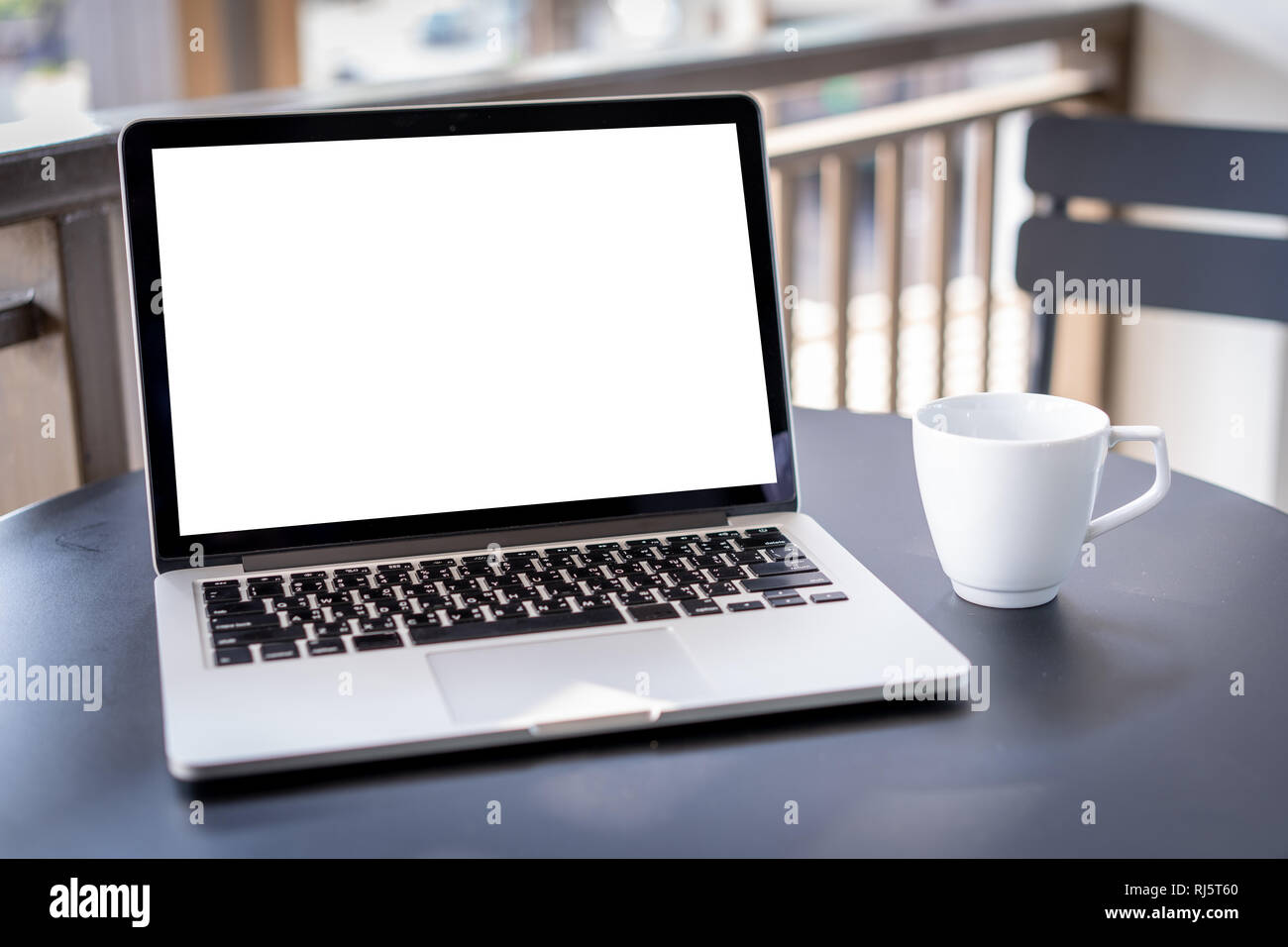 mock up Using laptop with blank screen computer modern Stock Photo - Alamy