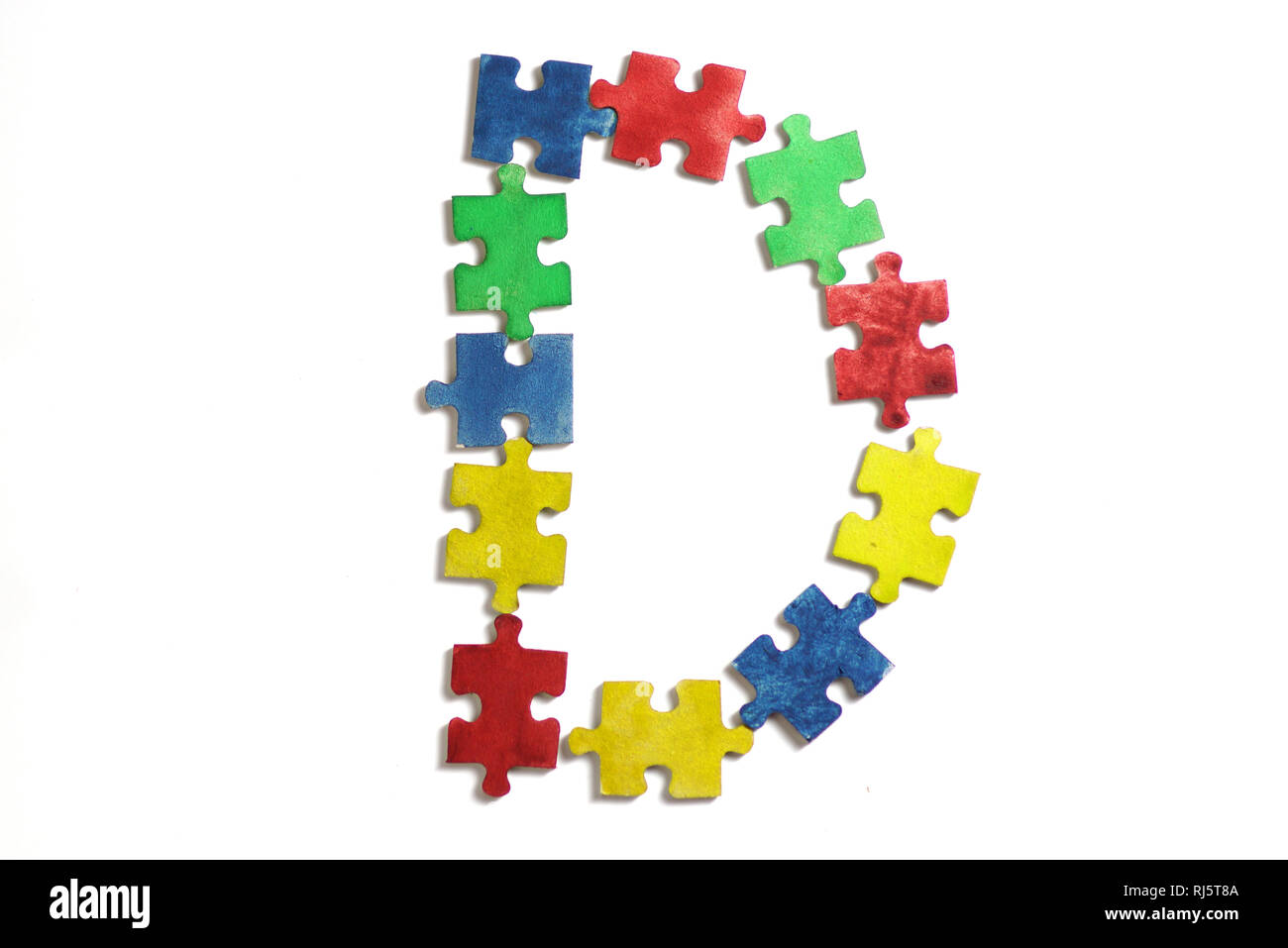 Colourful jigsaw puzzle and alphabet tiles with AUTISM word. Autism ...