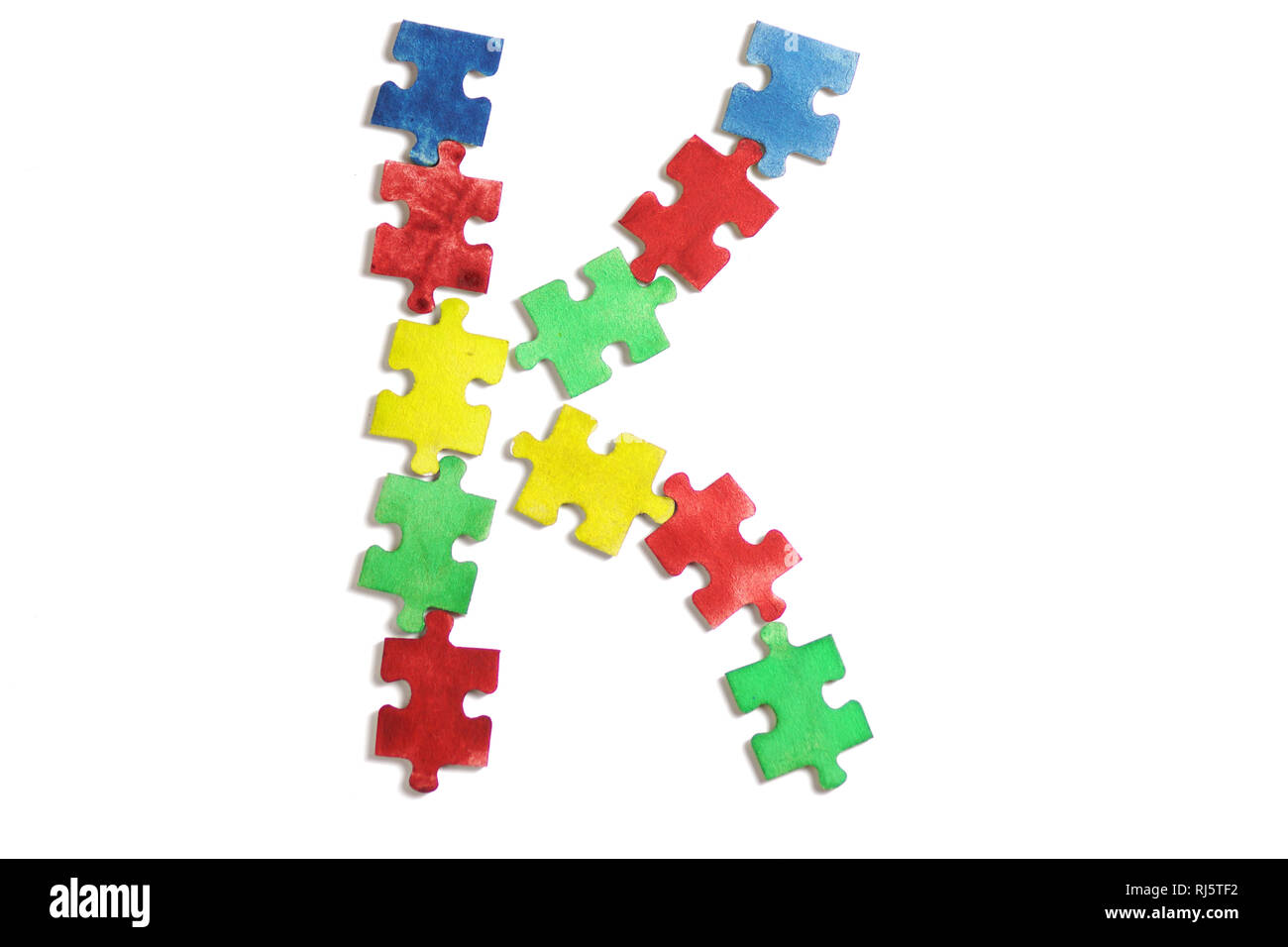 Colourful jigsaw puzzle and alphabet tiles with AUTISM word. Autism ...
