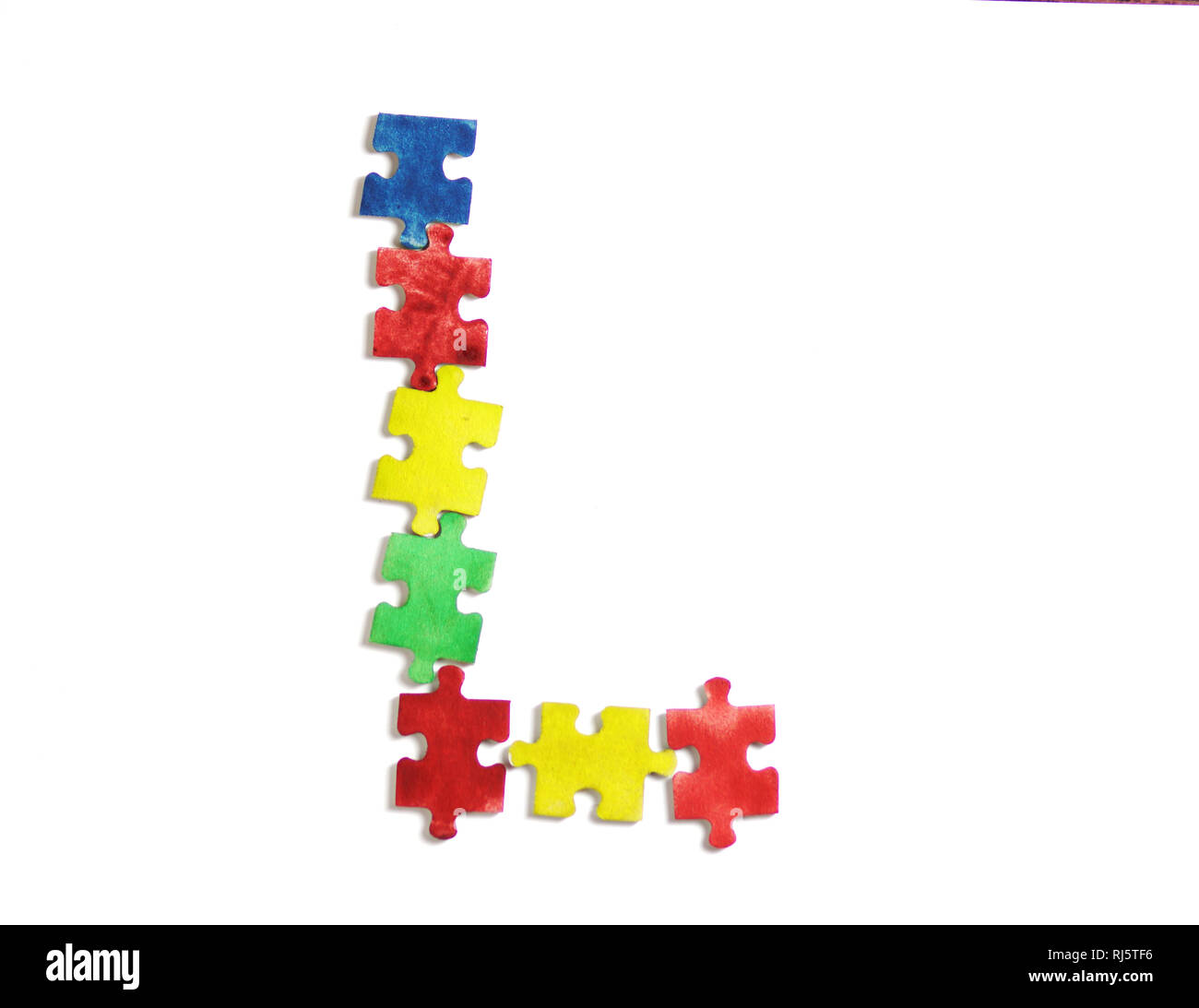 Colourful jigsaw puzzle and alphabet tiles with AUTISM word. Autism ...