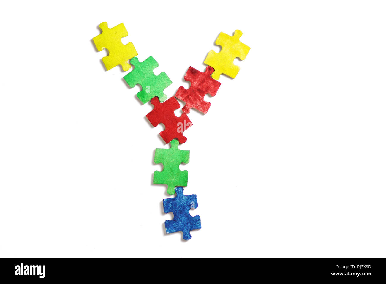 Colourful jigsaw puzzle and alphabet tiles with AUTISM word. Autism ...