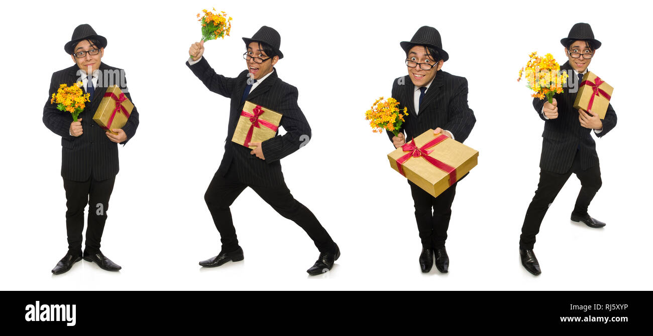 Funny man with flowers and giftbox Stock Photo - Alamy