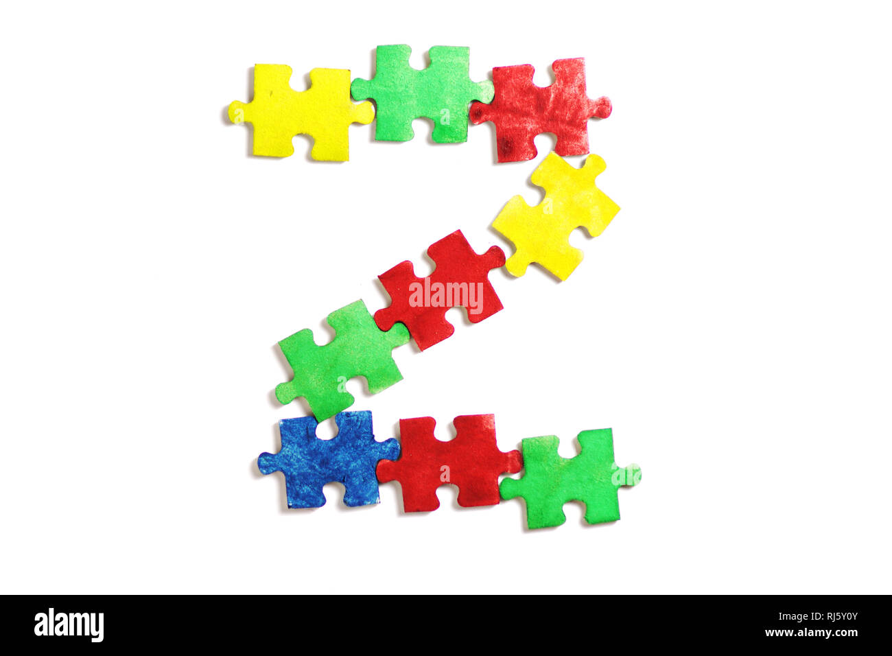 Colourful jigsaw puzzle and alphabet tiles with AUTISM word. Autism ...