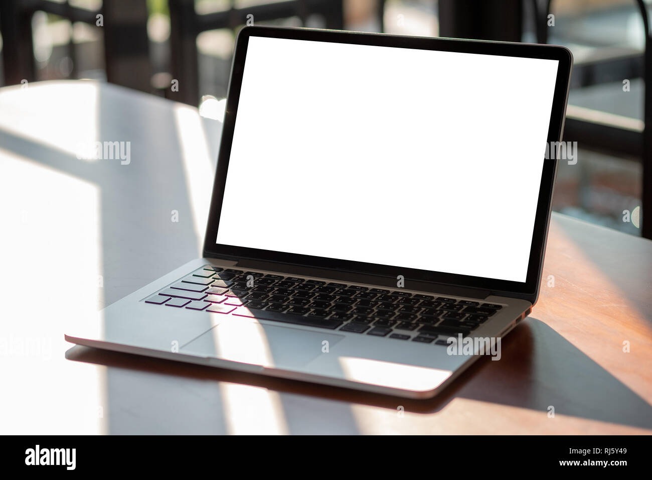 mock up Using laptop with blank screen computer modern Stock Photo - Alamy