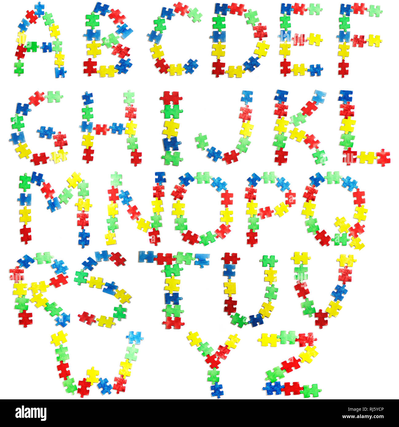 Colourful jigsaw puzzle and alphabet tiles with AUTISM word. Autism ...