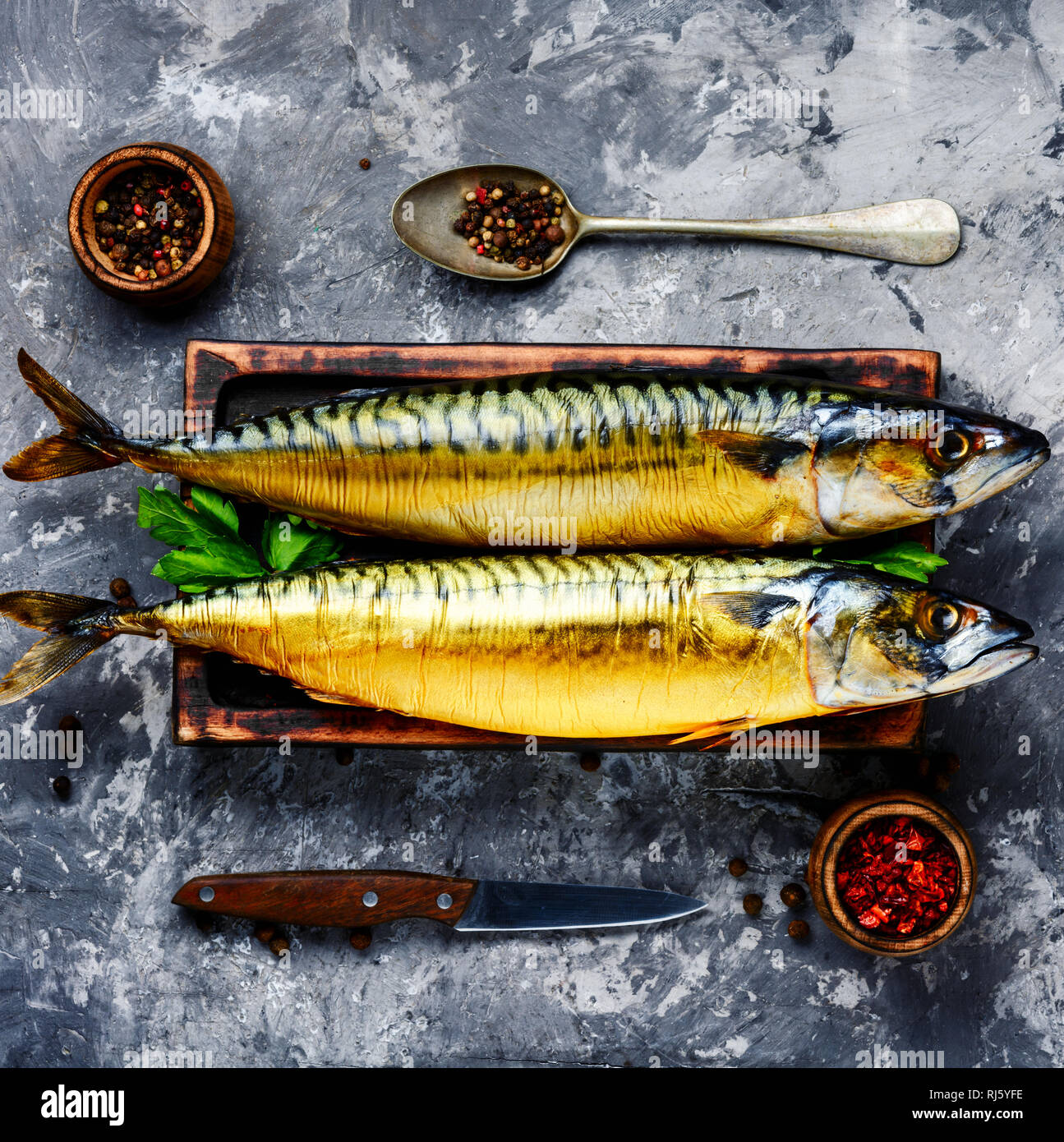 Appetizing smoked fish on kitchen board.Smoked mackerel Stock Photo - Alamy