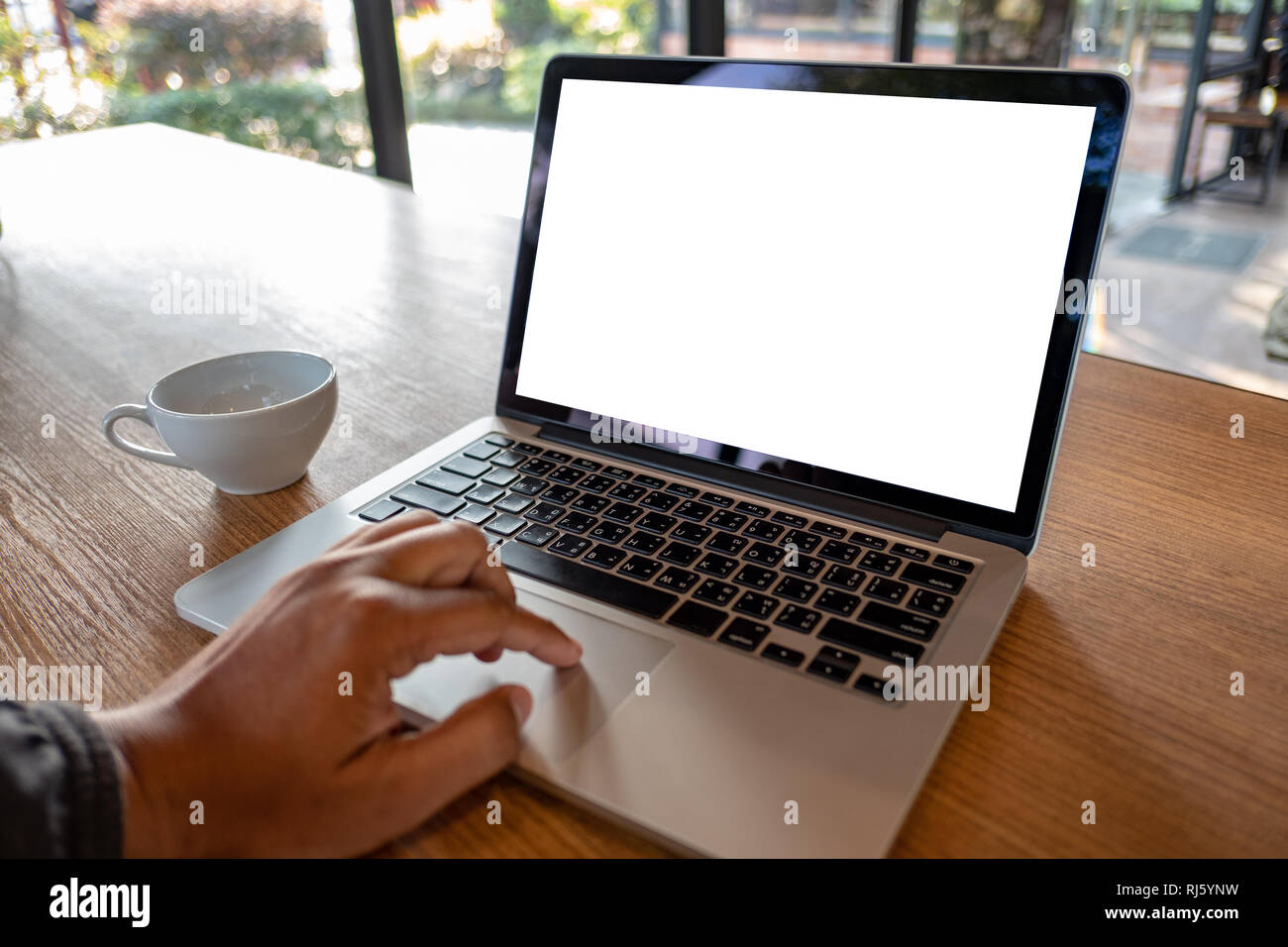 mock up Using laptop with blank screen computer modern Workspace in ...