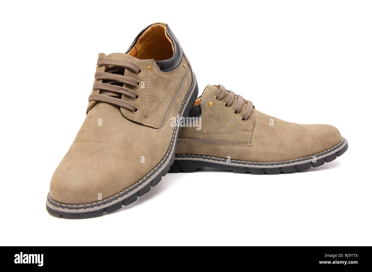 Brown suade shoes isolated on white background Stock Photo - Alamy