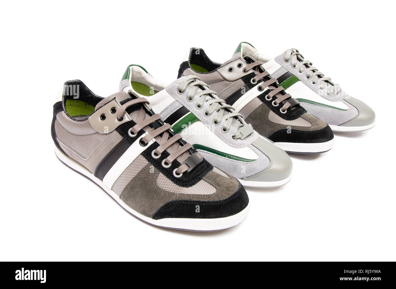 Selection of trainers isolated on white Stock Photo - Alamy