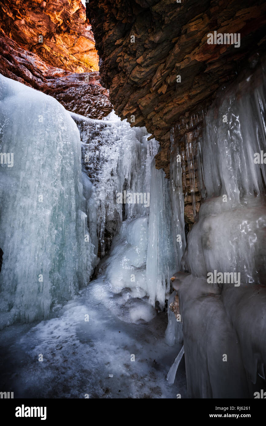 Frozen waterfall in a mountain gorge Stock Photo - Alamy