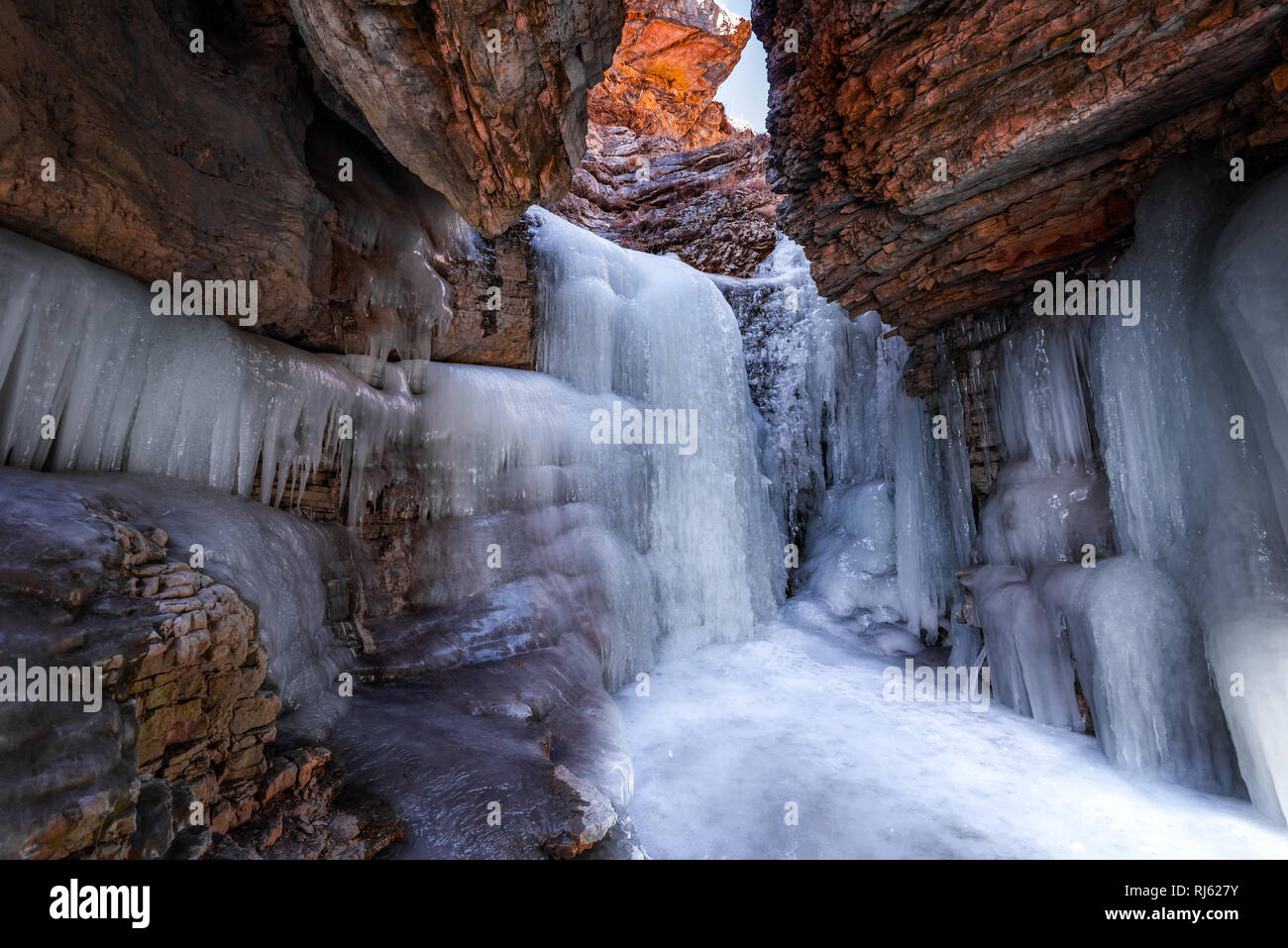 Frozen waterfall in a mountain gorge Stock Photo - Alamy
