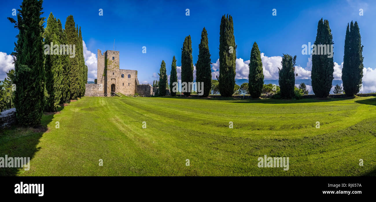 Castello di Romena located on top of a hill, framed by cypresses Stock ...