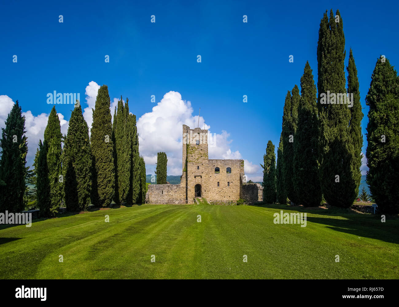 Castello di Romena located on top of a hill, framed by cypresses Stock ...