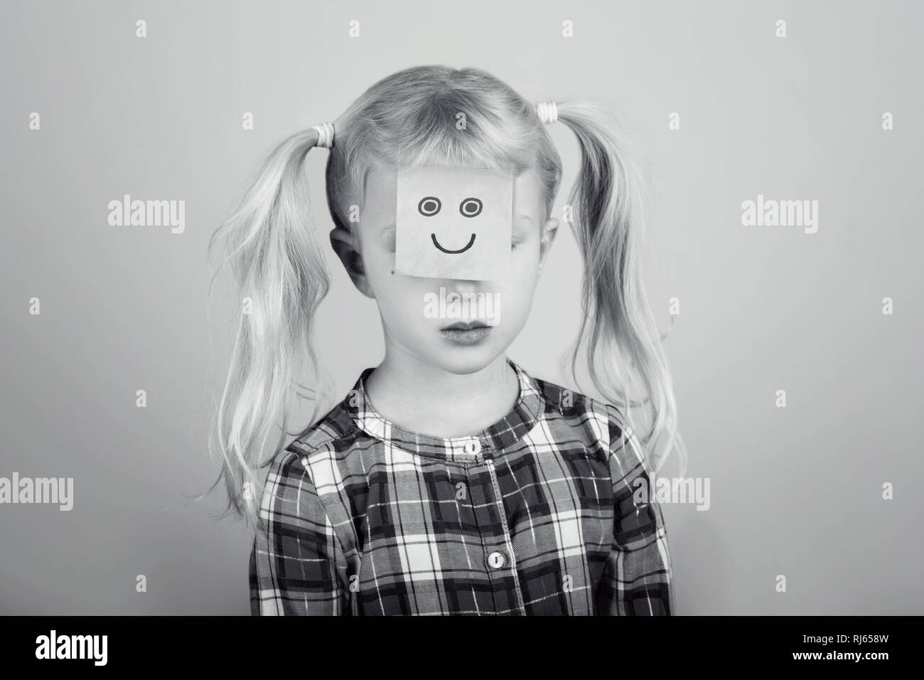 Black and white portrait of sad unhappy Caucasian preschool girl with ...